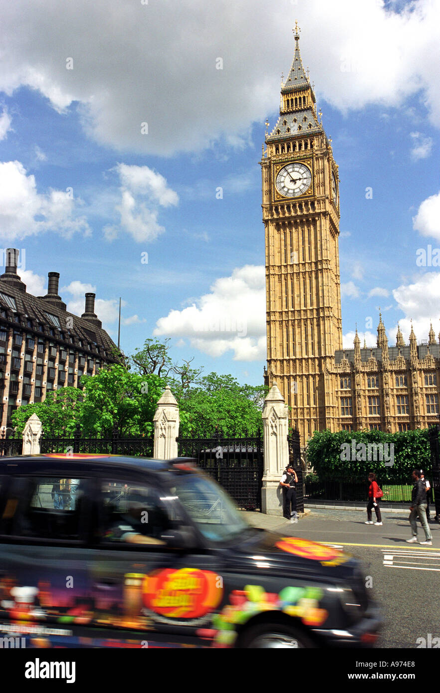 A London Taxi passes Big Ben and the Houses of Parliament London ...