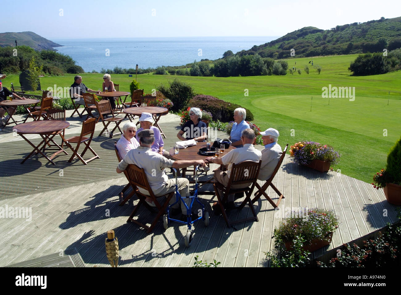 People Relaxing on Club House Terrace Langland Bay Golf Course Gower ...