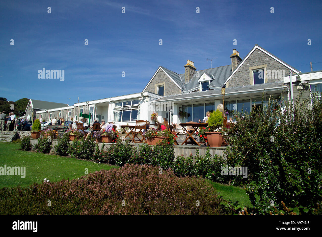 People Relaxing on Club House Terrace Langland Bay Golf Course Gower ...