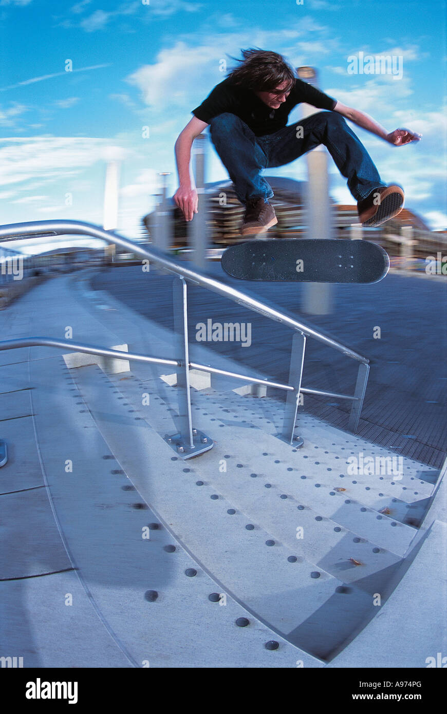 Skateboarder Performs Stunt Trick Move Ollie Stock Photo - Alamy