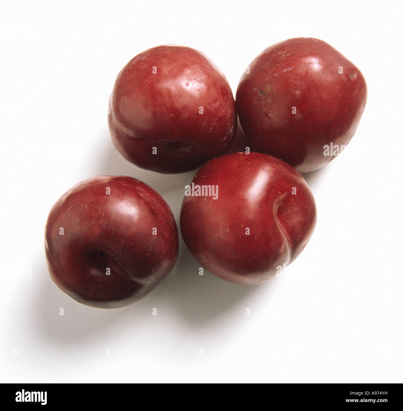 Four Red Plums FoodCollection Stock Photo - Alamy