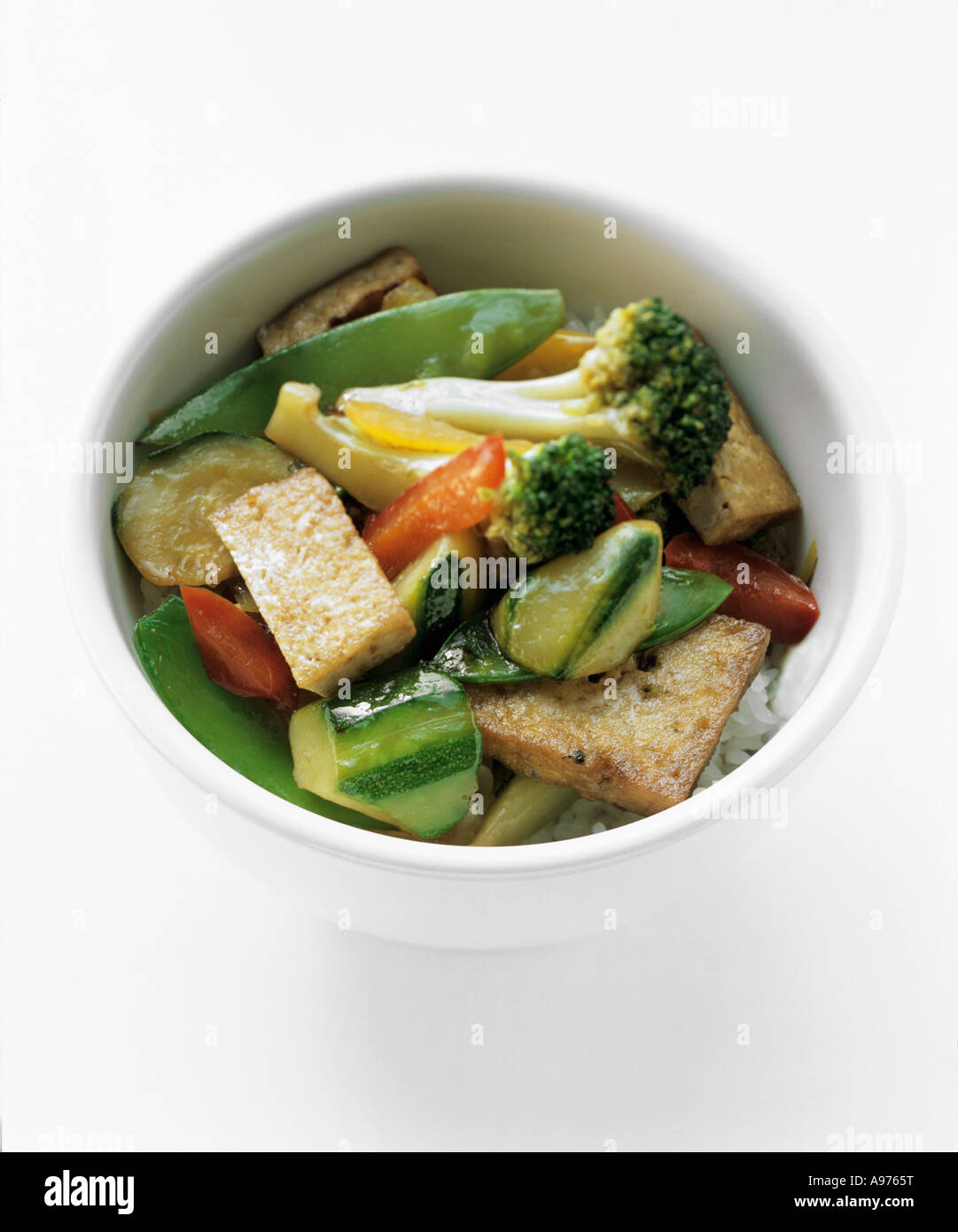 Tofu and Vegetable Stir Fry Over Rice FoodCollection Stock Photo - Alamy