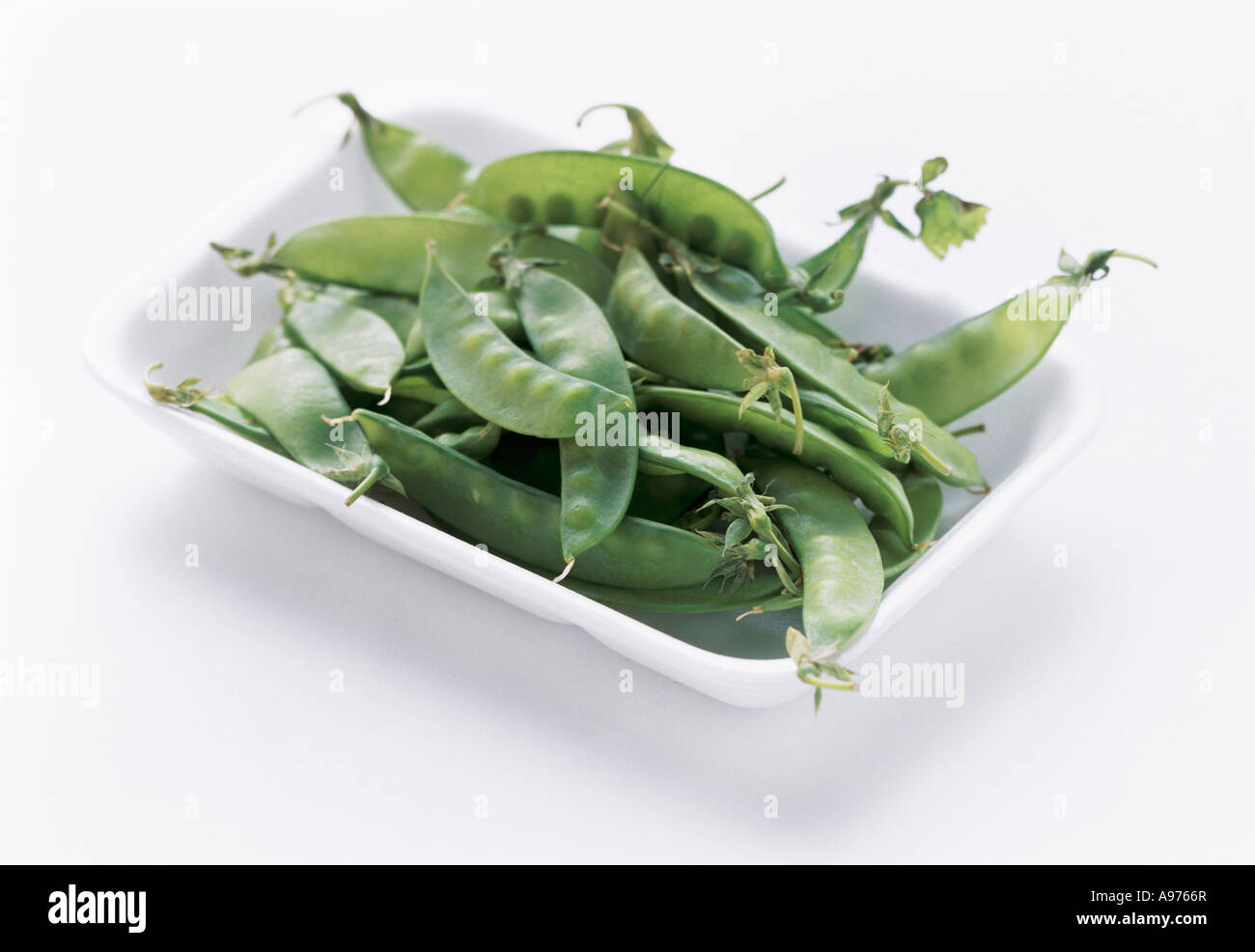 Snow Peas in a Plastic Container FoodCollection Stock Photo - Alamy
