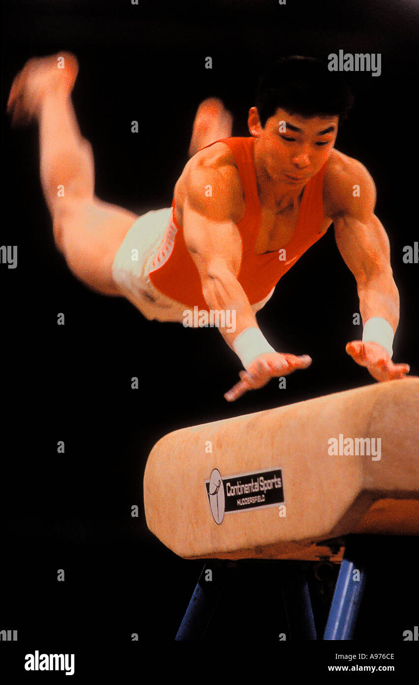 Male gymnast vaulting Stock Photo - Alamy