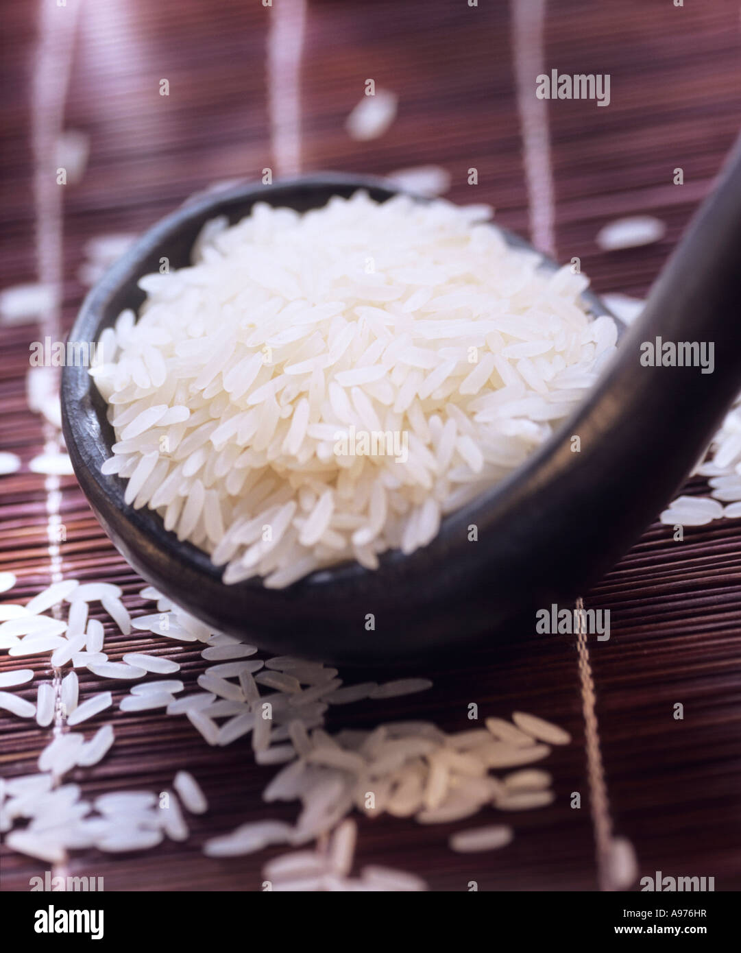A Ladle of Uncooked Long Grain White Rice FoodCollection Stock Photo ...