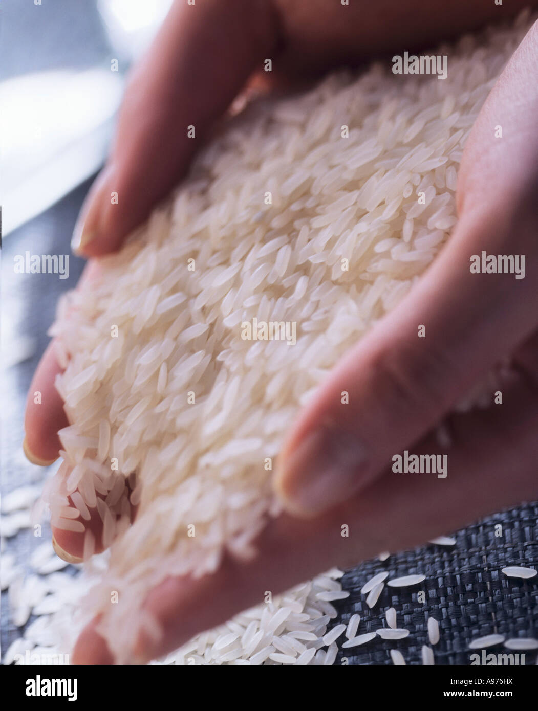 A Handful of Uncooked Rice FoodCollection Stock Photo - Alamy