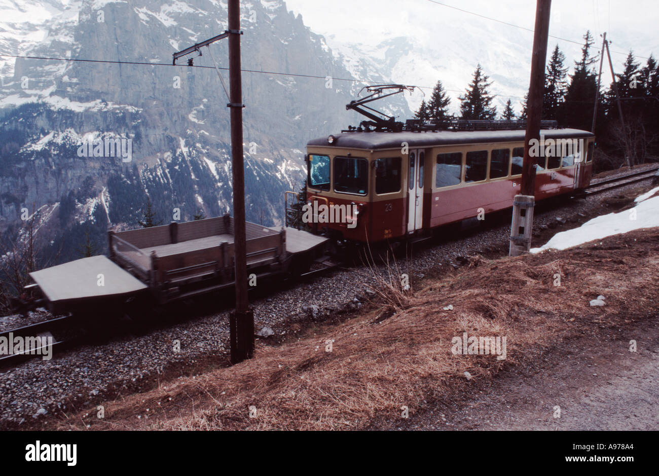 Rail car in the mountains in Switzerland with open luggage and cargo ...