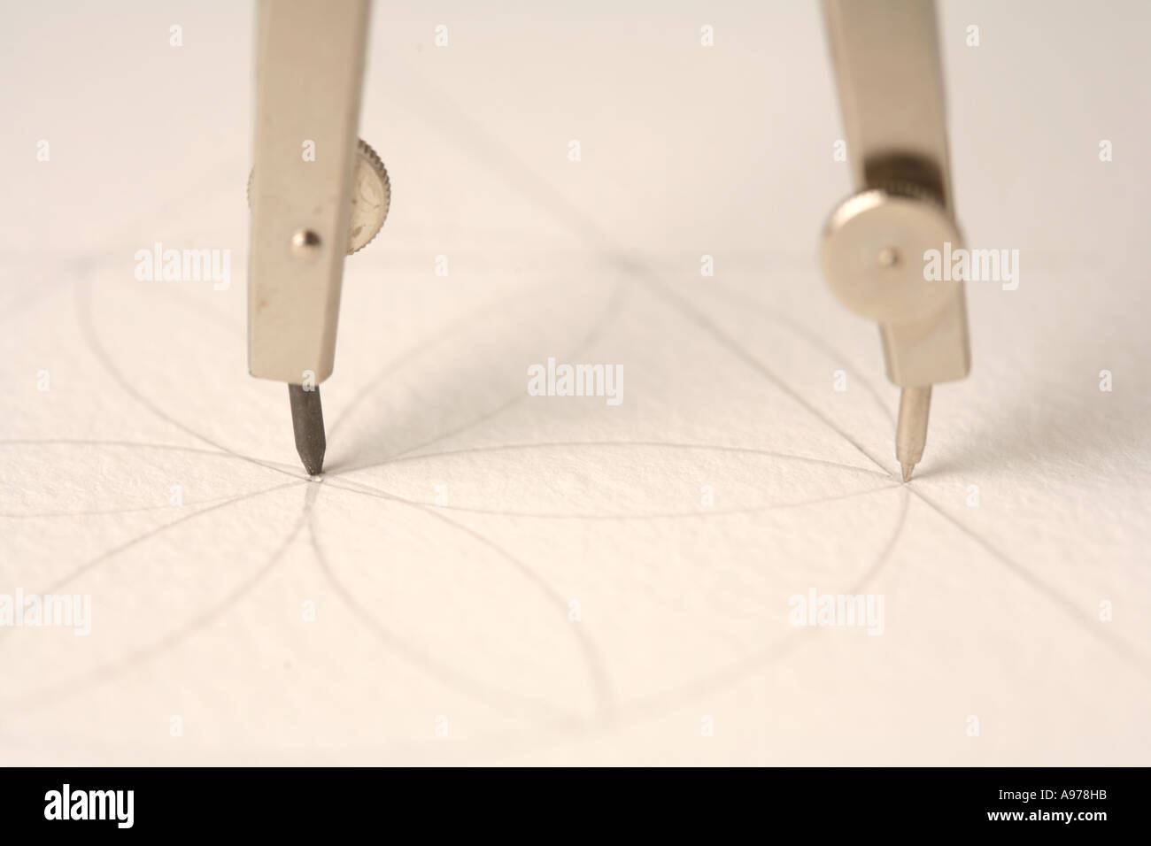 compass drawing flower pattern Stock Photo - Alamy