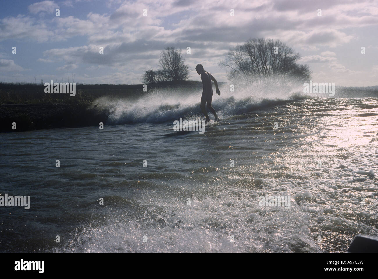Surfer Riding the Severn Bore Wave River Severn South East Wales Stock ...