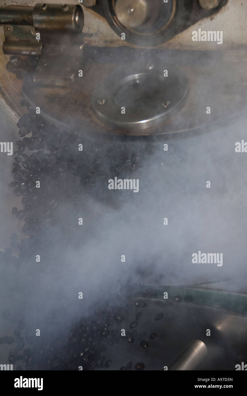 Coffee being cooled in the cooling car of a small batch roasting oven ...