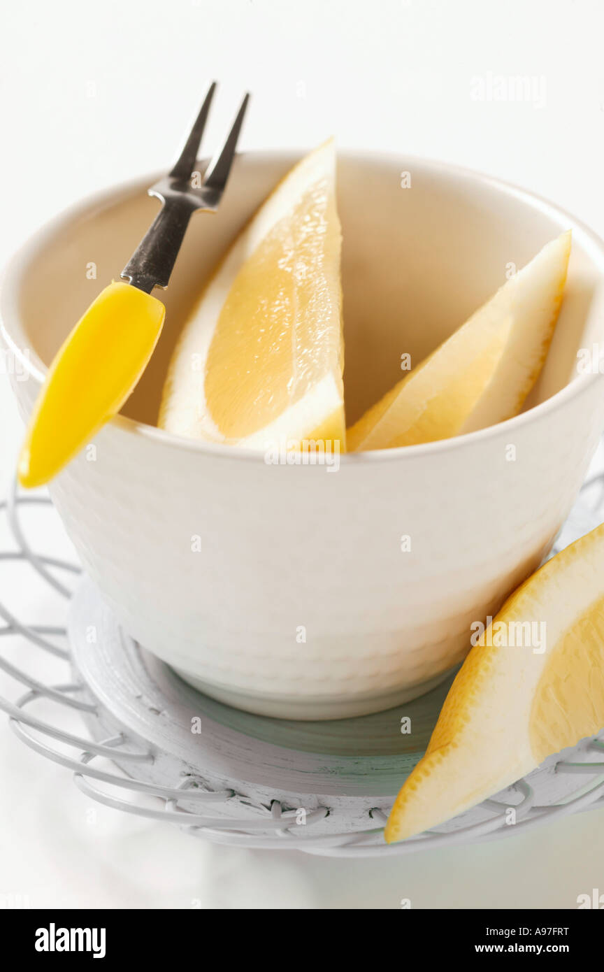 Lemon wedges in small bowl FoodCollection Stock Photo - Alamy