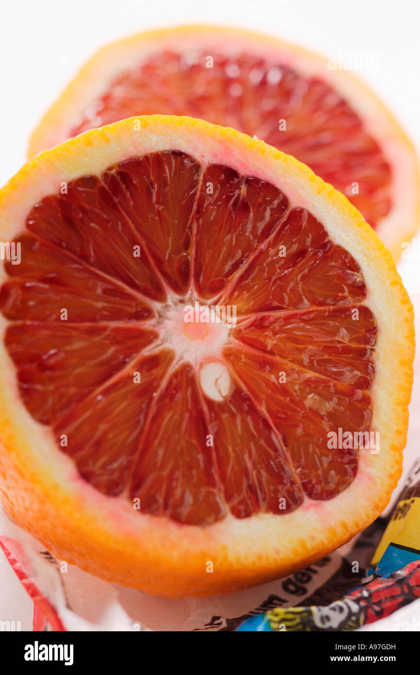 Blood orange halves on wrapping paper FoodCollection Stock Photo - Alamy