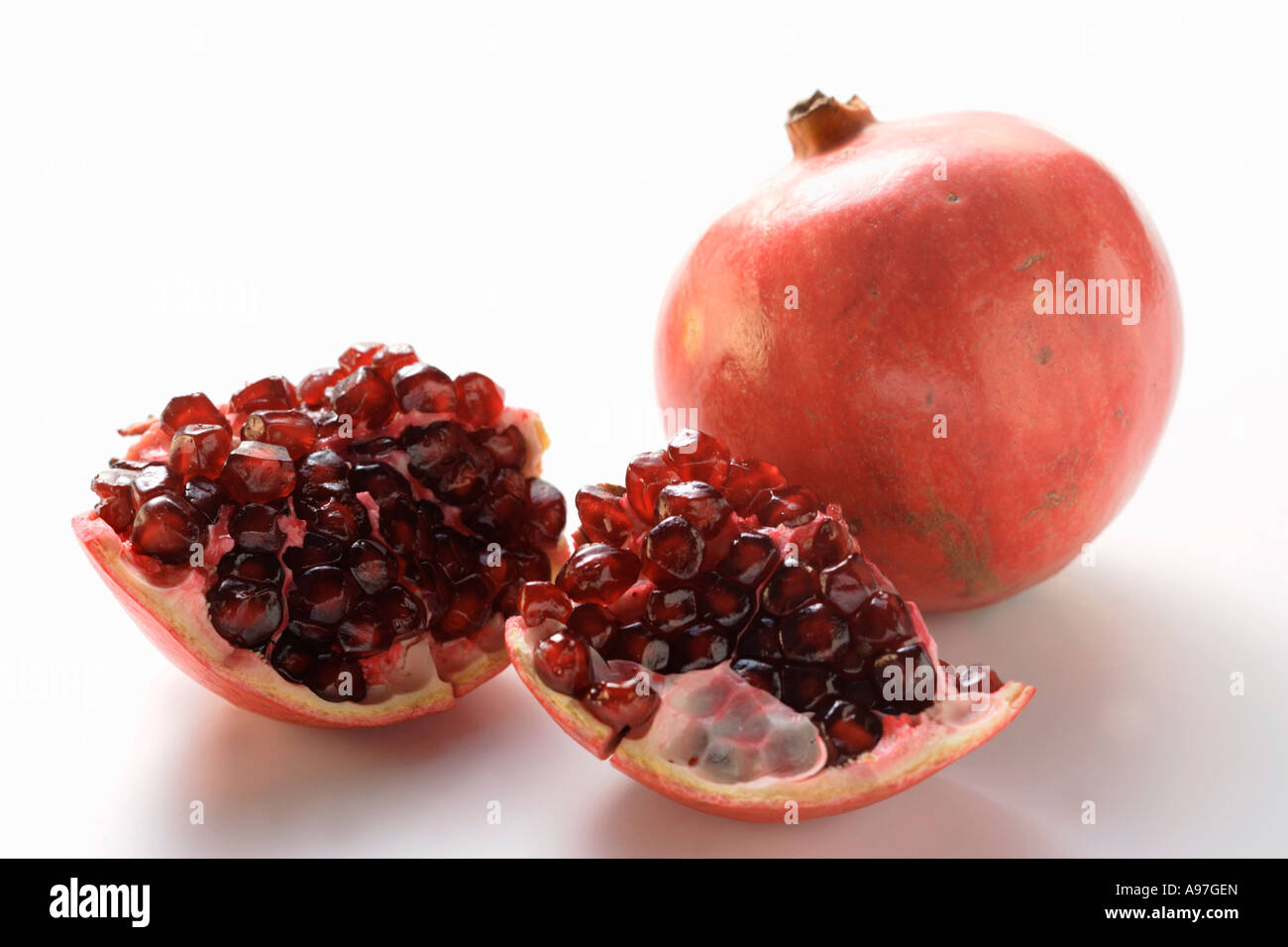 Two pomegranates one halved FoodCollection Stock Photo - Alamy