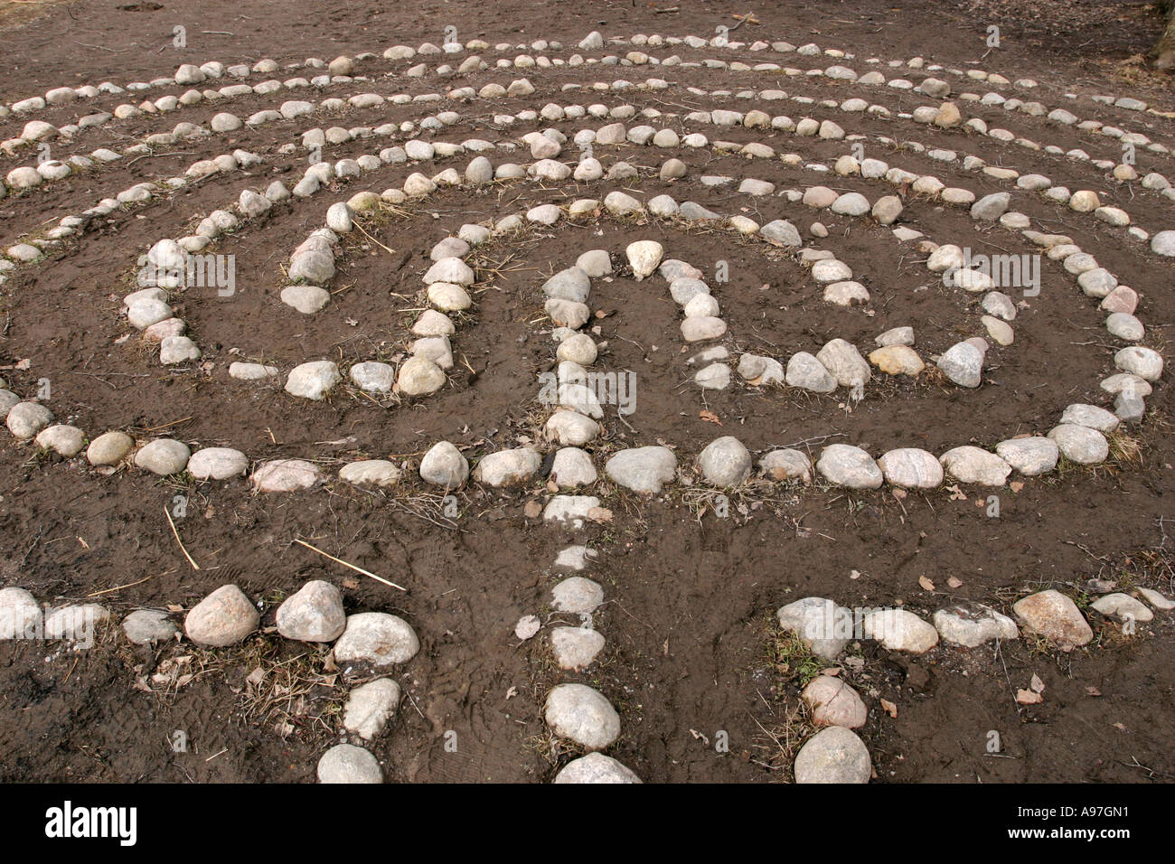 Labyrinth made of rocks on the ground Stock Photo - Alamy