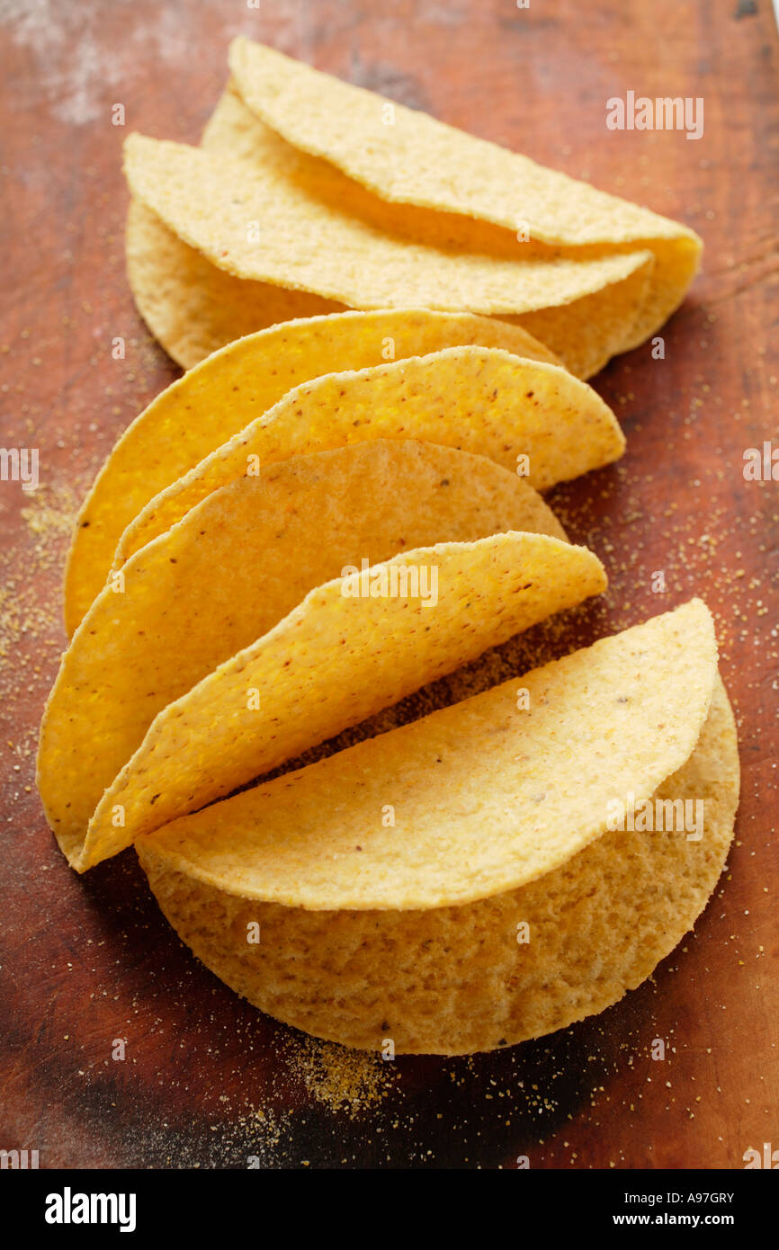 Taco shells on wooden background FoodCollection Stock Photo - Alamy