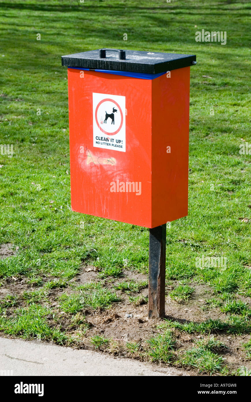 Clean it Up Dog Poo Bin in Municipal Park Stock Photo - Alamy