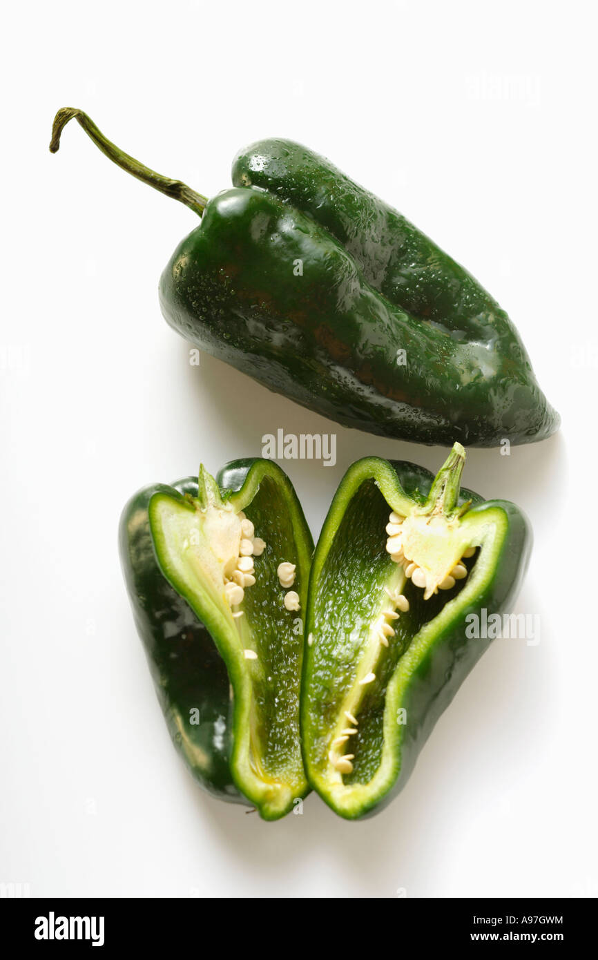 Green peppers Poblano from Mexico whole and halved FoodCollection Stock ...