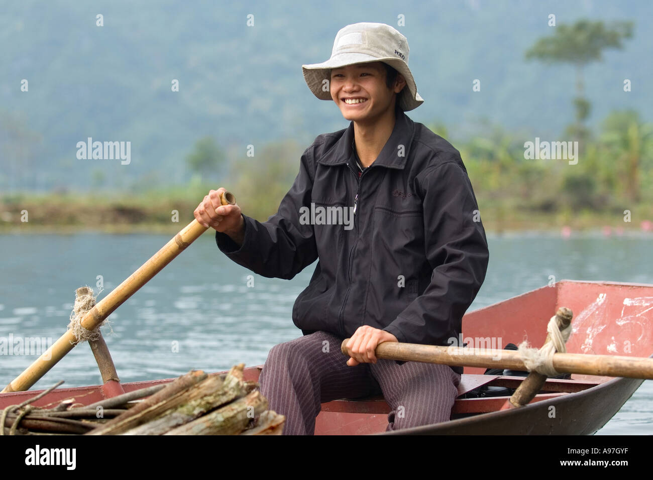 Asian girl rowing on boat hi-res stock photography and images - Alamy