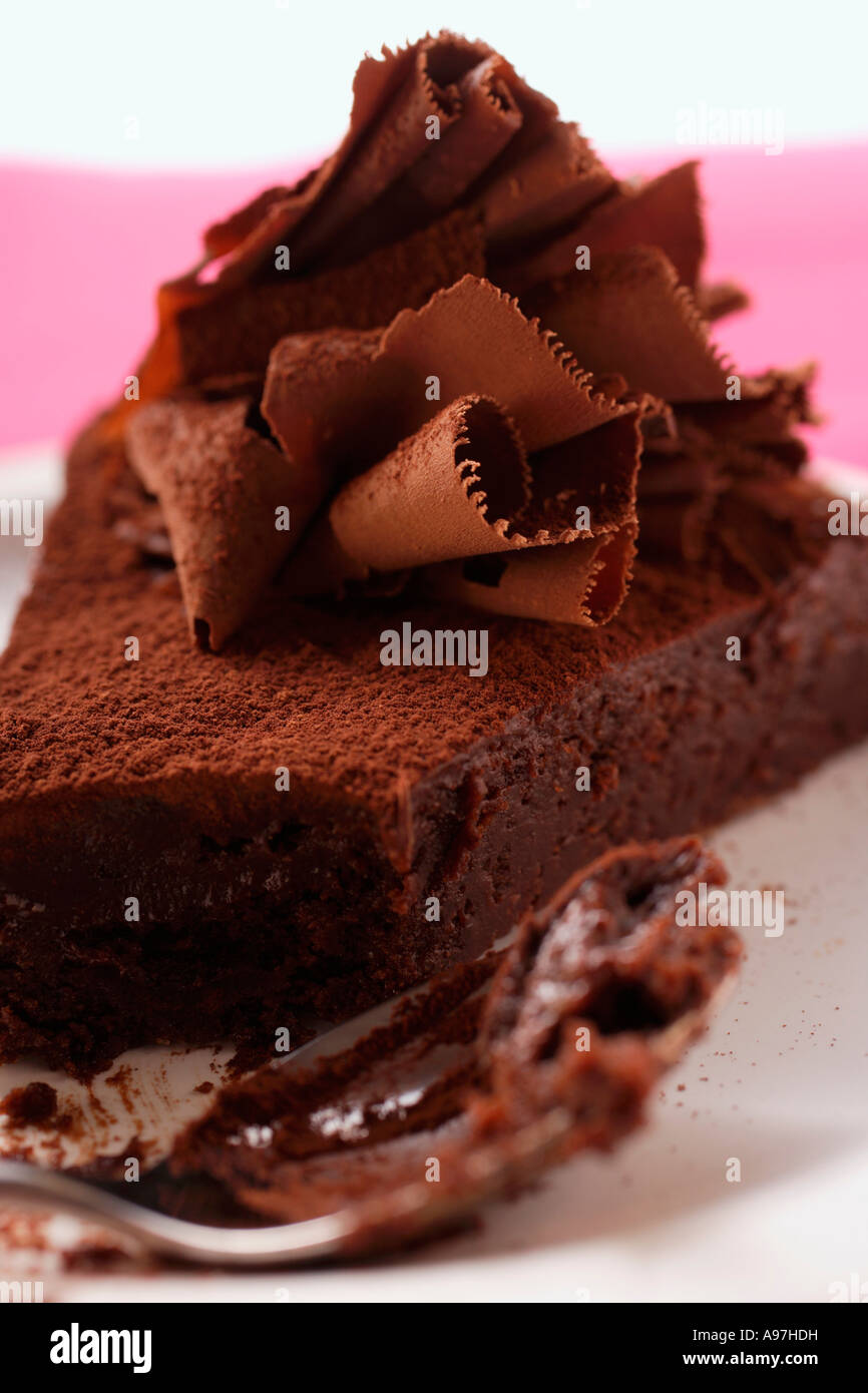 Piece of chocolate cake with chocolate curls FoodCollection Stock Photo ...