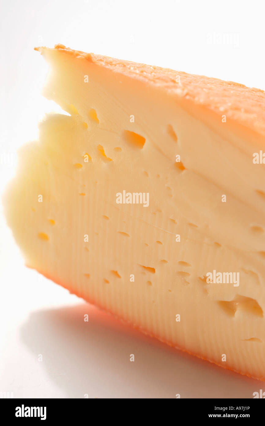 A piece of Chaumes cheese FoodCollection Stock Photo - Alamy