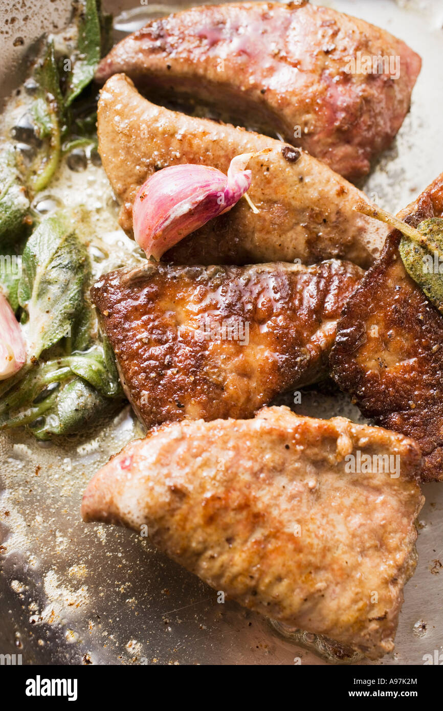 Fried calf s liver with sage and garlic in frying pan FoodCollection ...