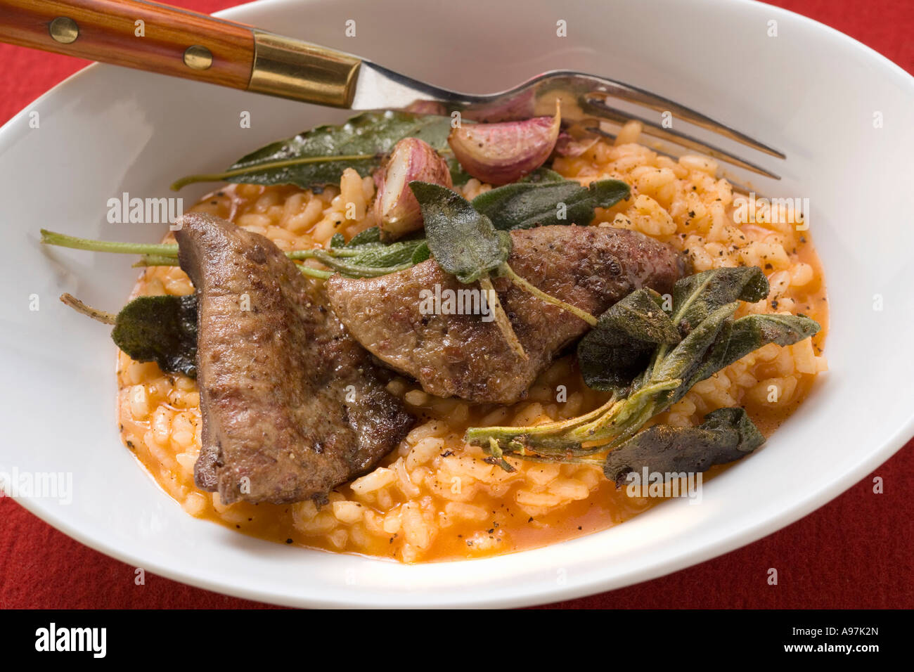Risotto with fried calf s liver sage and garlic FoodCollection Stock ...