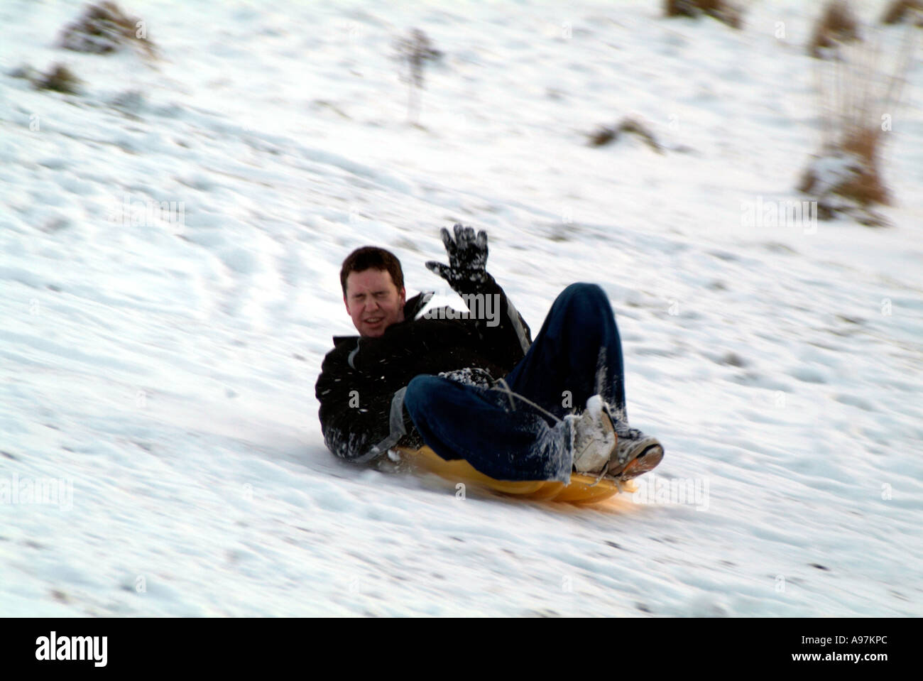Teenagers sledging hi-res stock photography and images - Alamy