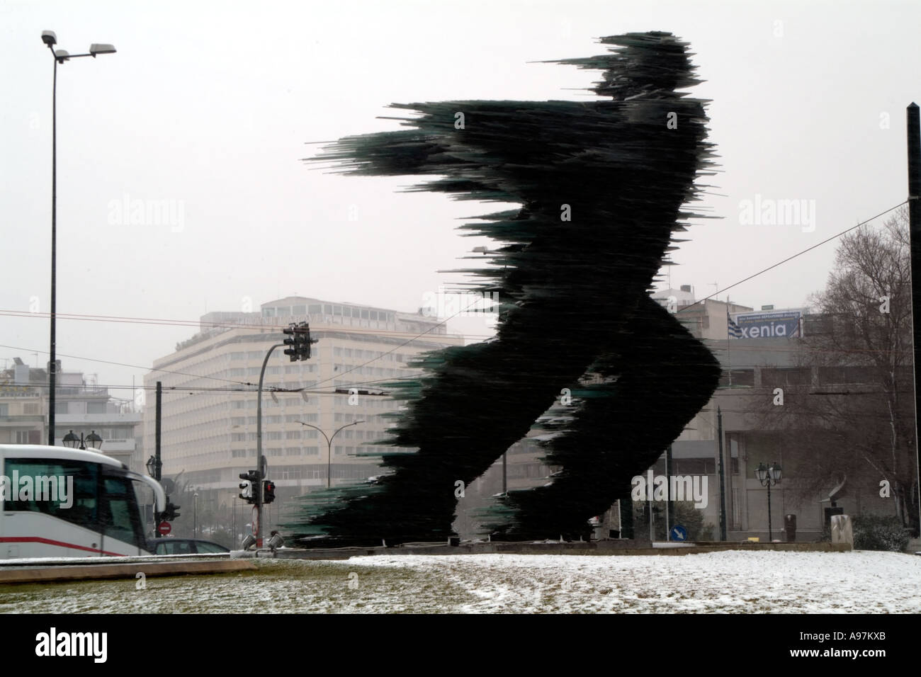 Glass sculpture of a man named The Runner by Kostas Varotsos in a ...