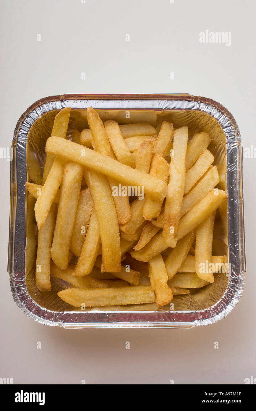Chips in aluminium tray FoodCollection Stock Photo - Alamy