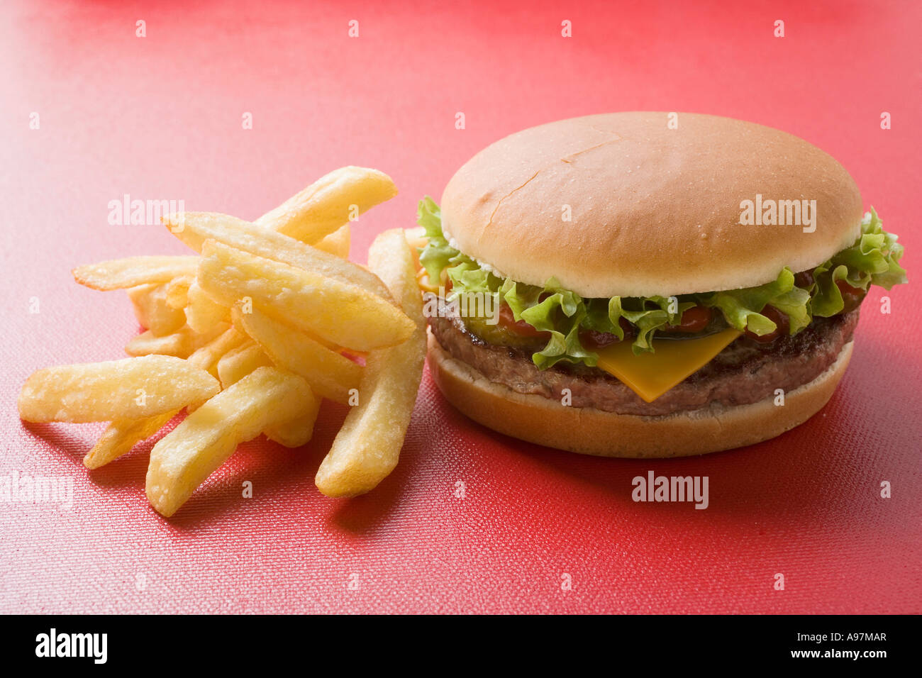 Cheeseburger with chips FoodCollection Stock Photo - Alamy