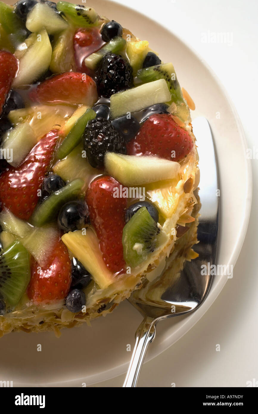 Fruit gateau with cake slice FoodCollection Stock Photo - Alamy