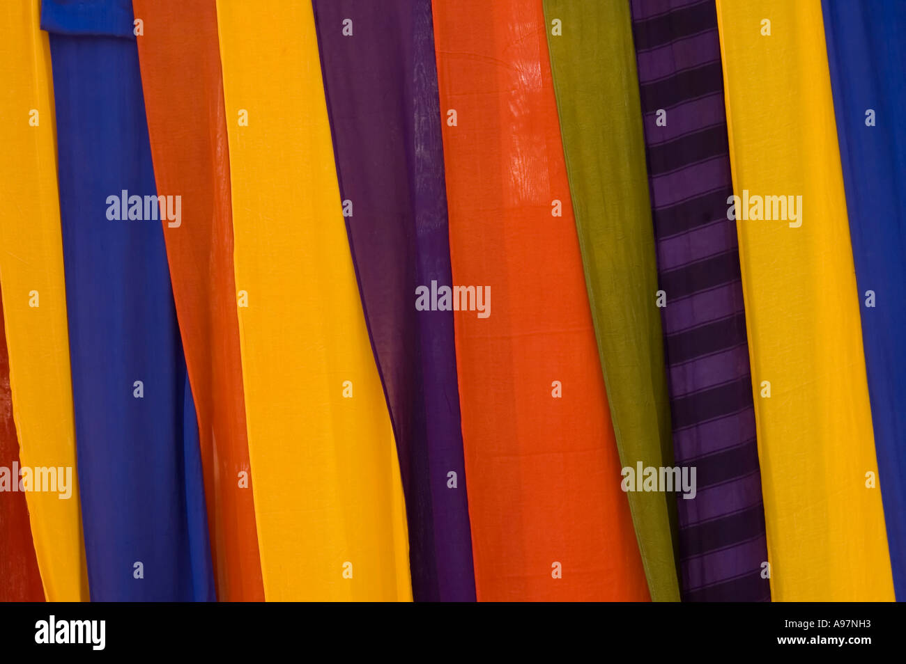 Traditional head scarf designs on sale in a market in Tunisia Stock ...