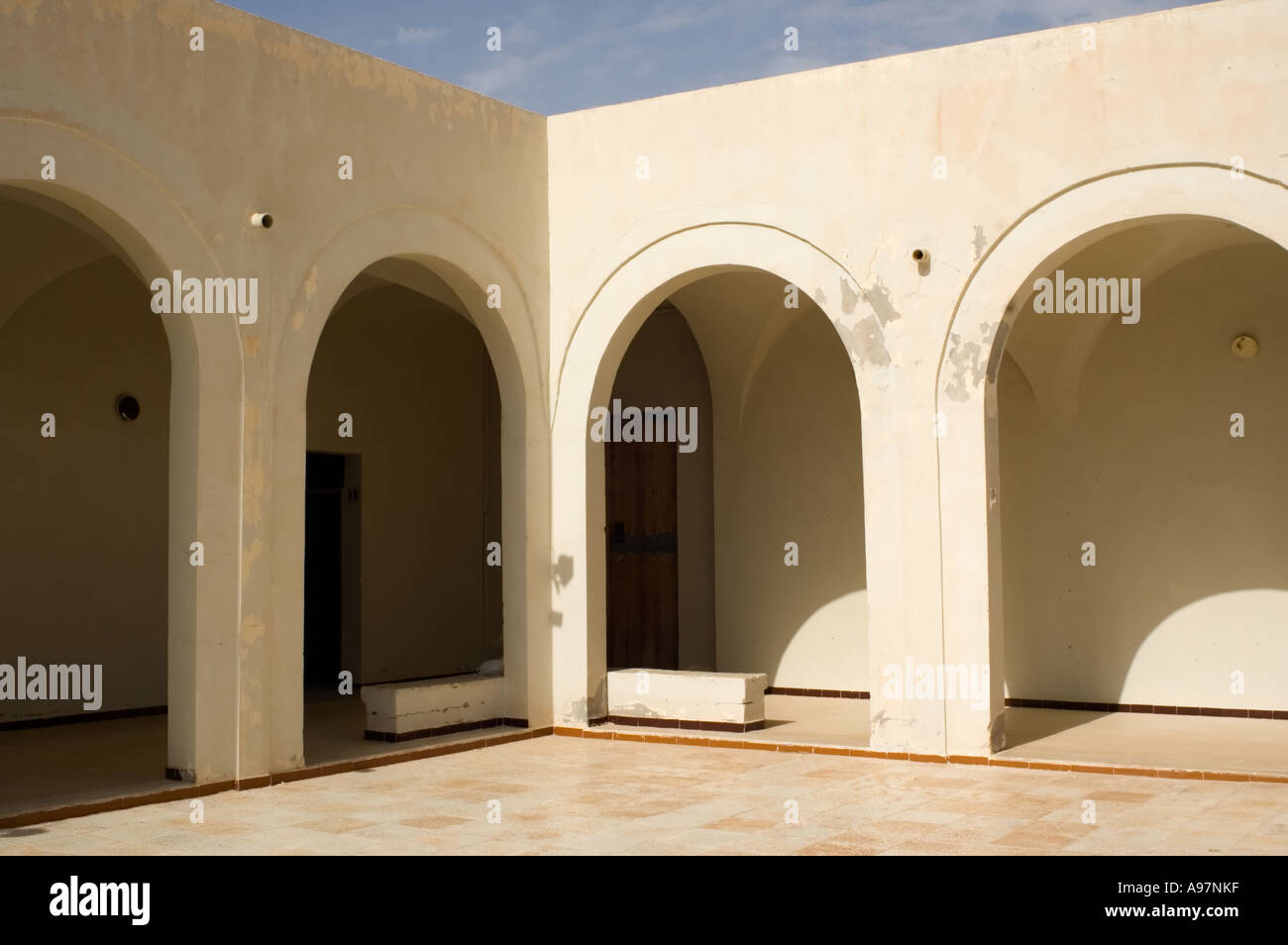 The arches in the courtyard of the Berber museum, Tunisia Stock Photo ...