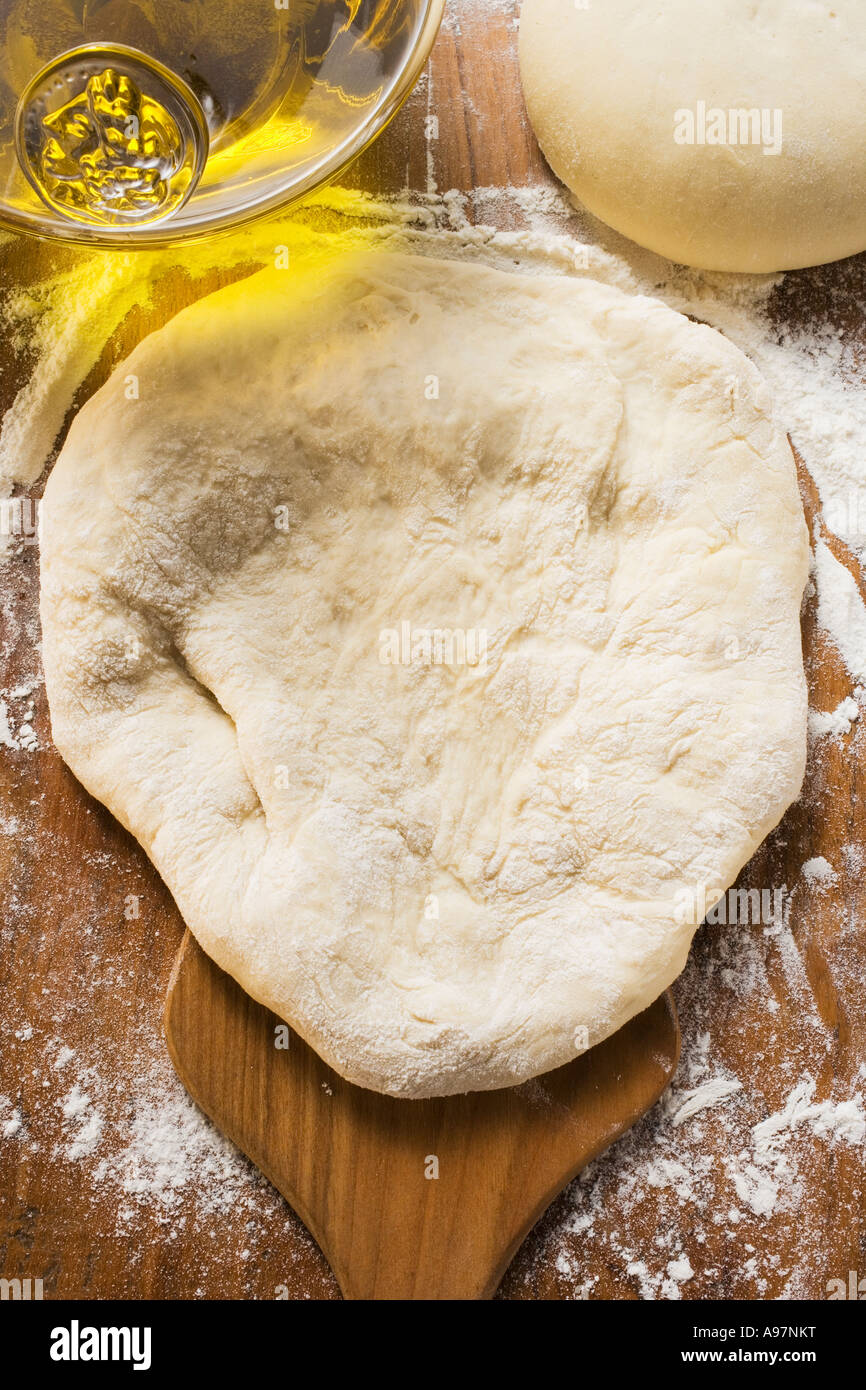 Uncooked dough rolled out and in a ball olive oil FoodCollection Stock ...