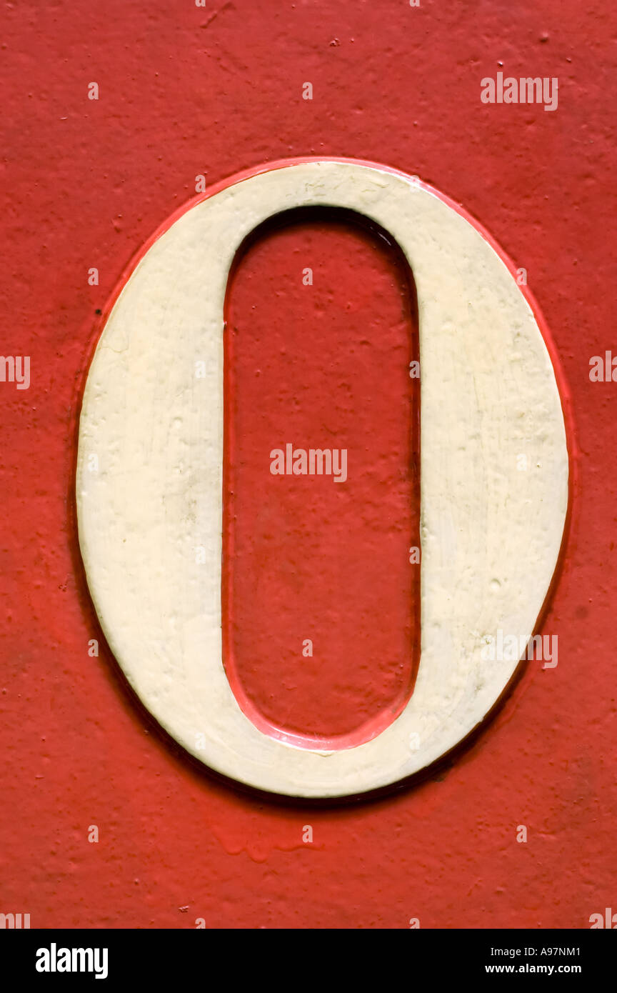 White number zero (0) on a red background Stock Photo - Alamy