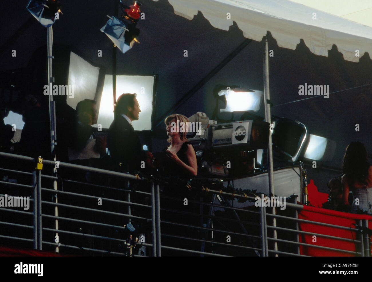 TV news personnel reporting from bridge above Hollywood Boulevard Stock ...