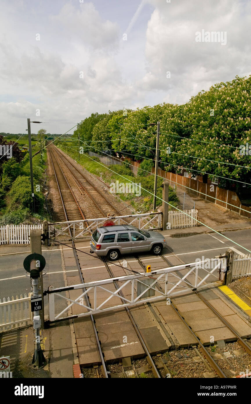 Car at a level crossing hi-res stock photography and images - Alamy