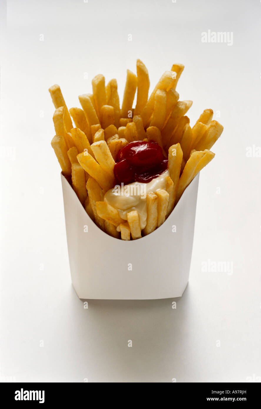 Chips with ketchup and mayo in white fast food box FoodCollection Stock ...