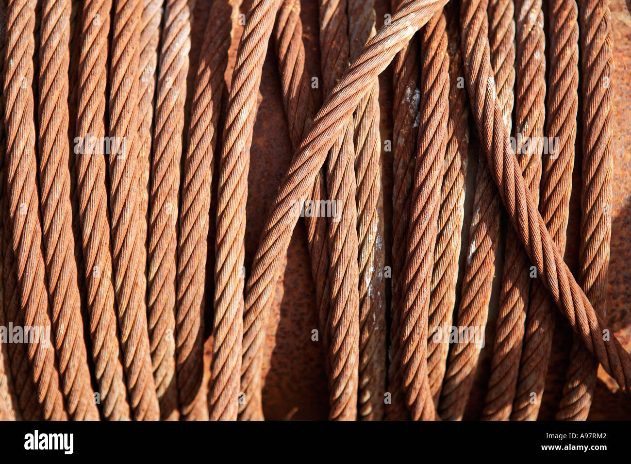 Rusty wire cable on a drum hoist Stock Photo - Alamy