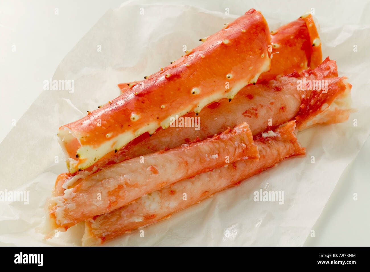 King crab legs on wrapping paper FoodCollection Stock Photo - Alamy