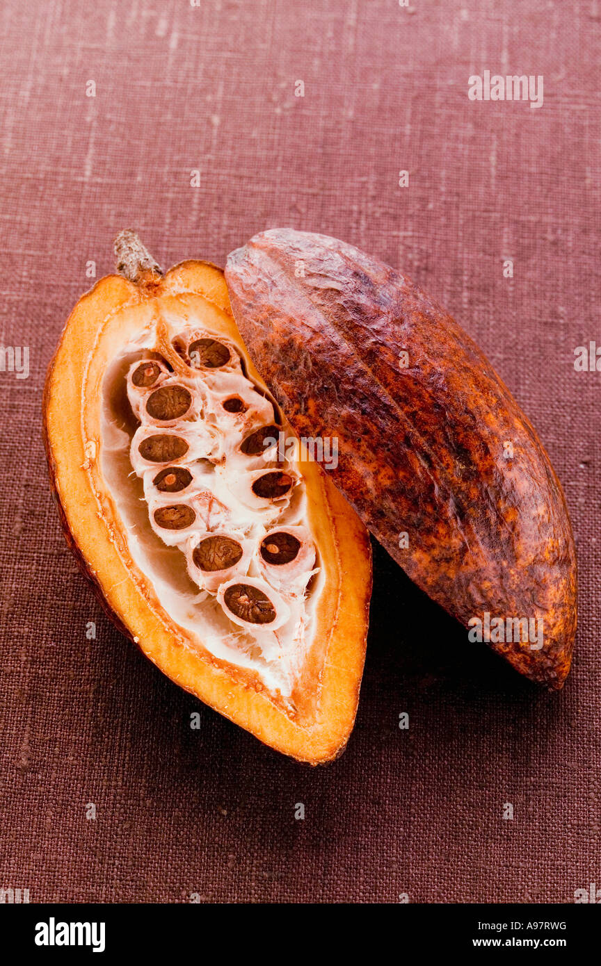 Cacao pod halved on brown background FoodCollection Stock Photo - Alamy