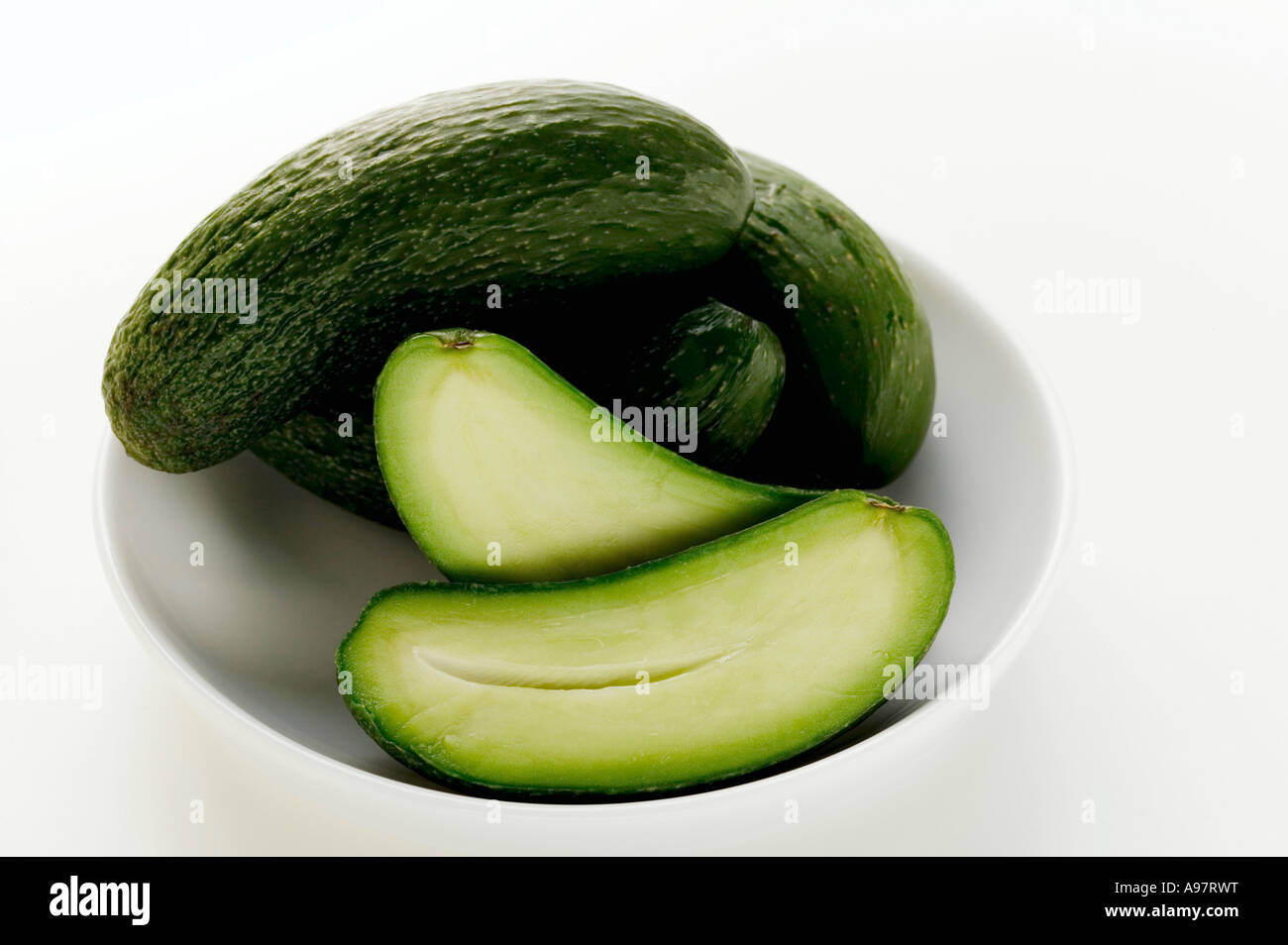 Baby courgettes one halved in bowl FoodCollection Stock Photo - Alamy