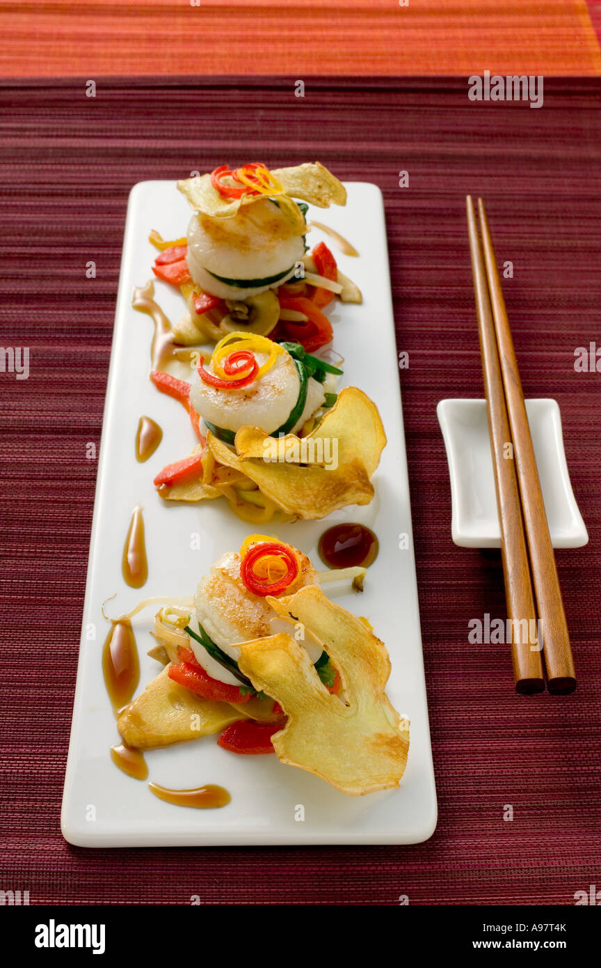 Scallops with deep fried ginger FoodCollection Stock Photo - Alamy