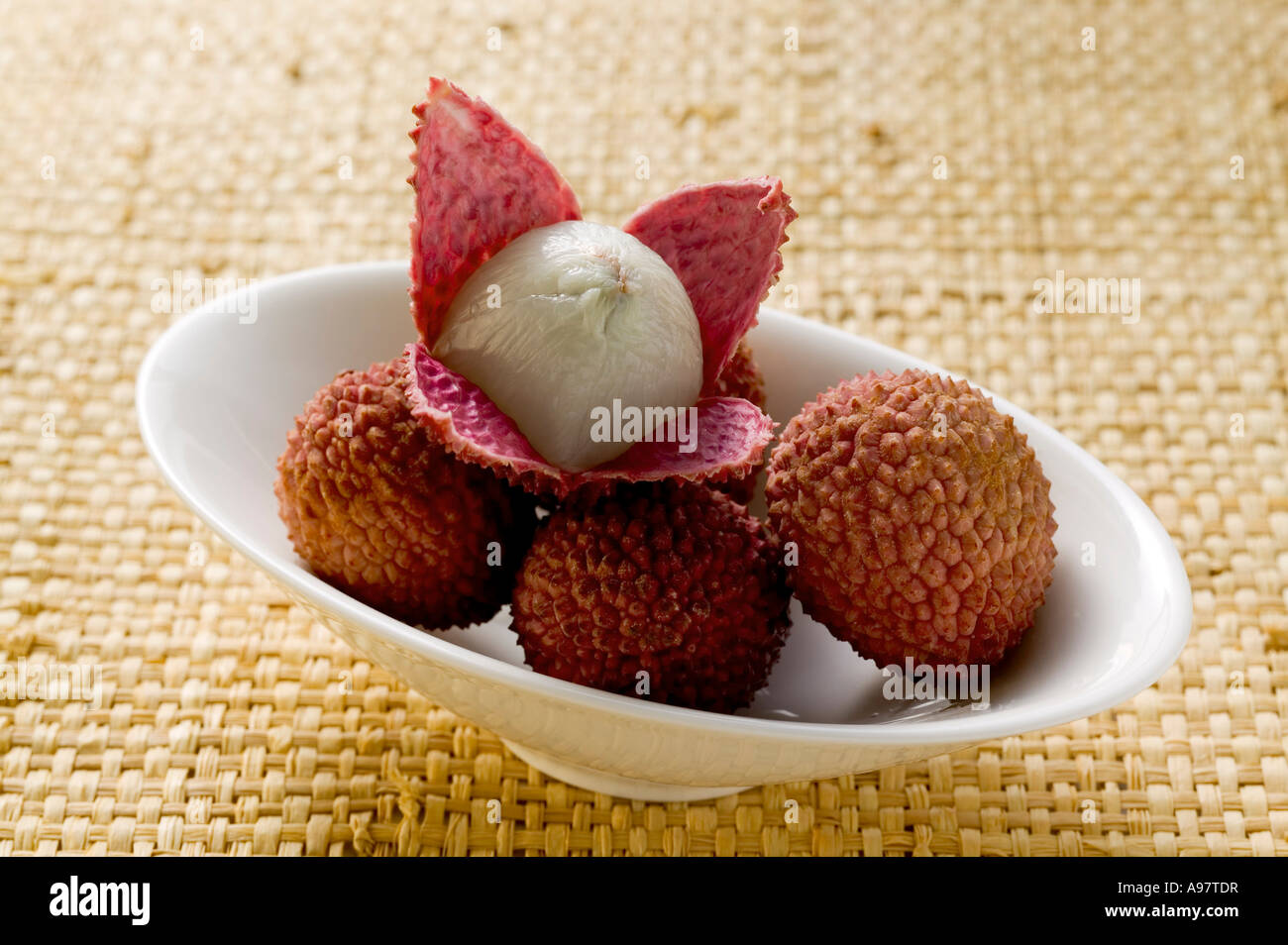 Lychees in white bowl FoodCollection Stock Photo - Alamy