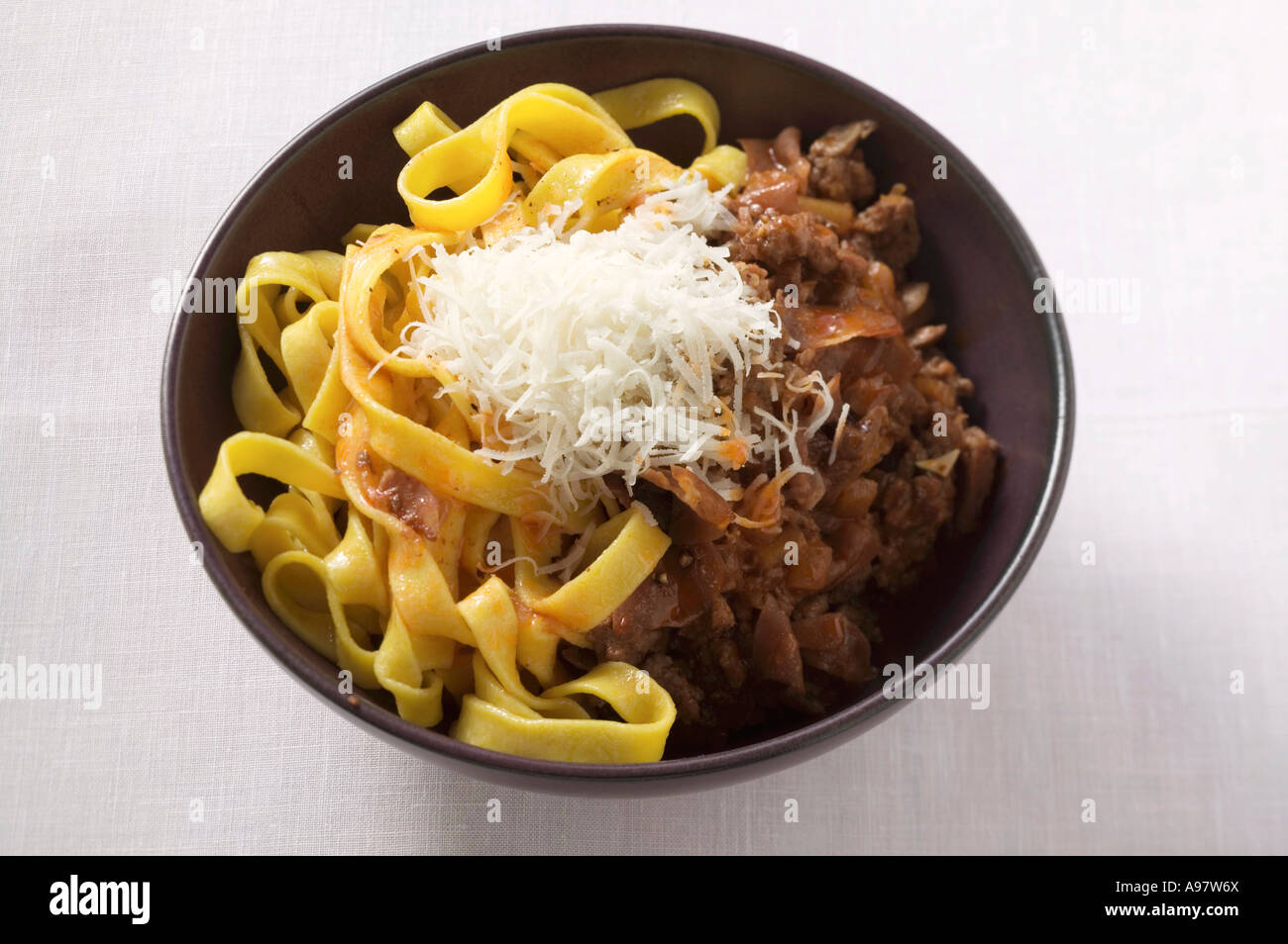 Saffron ribbon pasta with mince ragout close up FoodCollection Stock ...