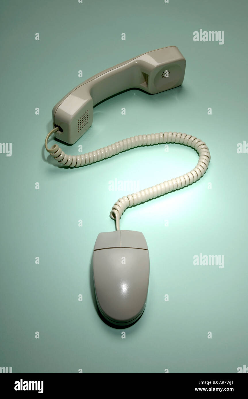 Telephone and computer mouse Stock Photo - Alamy