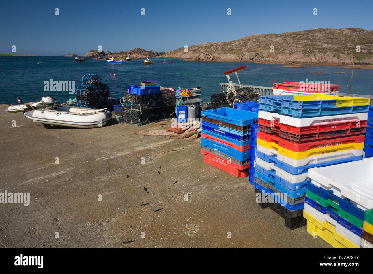 Fish boxes, Fionnphort pier, Iona Sound, Isle of Mull, Scotland, UK ...