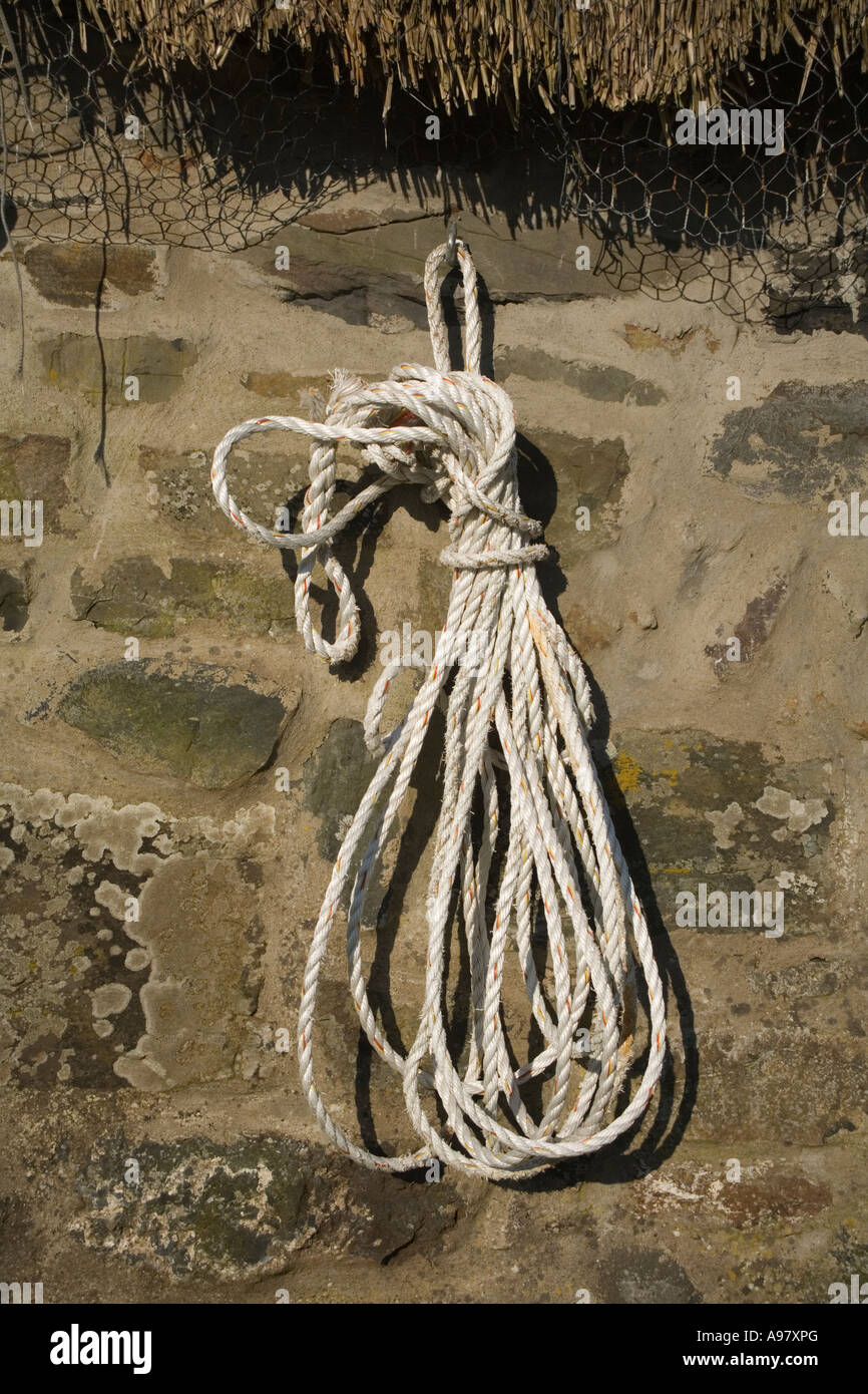 Rope tied up at cottage Stock Photo - Alamy