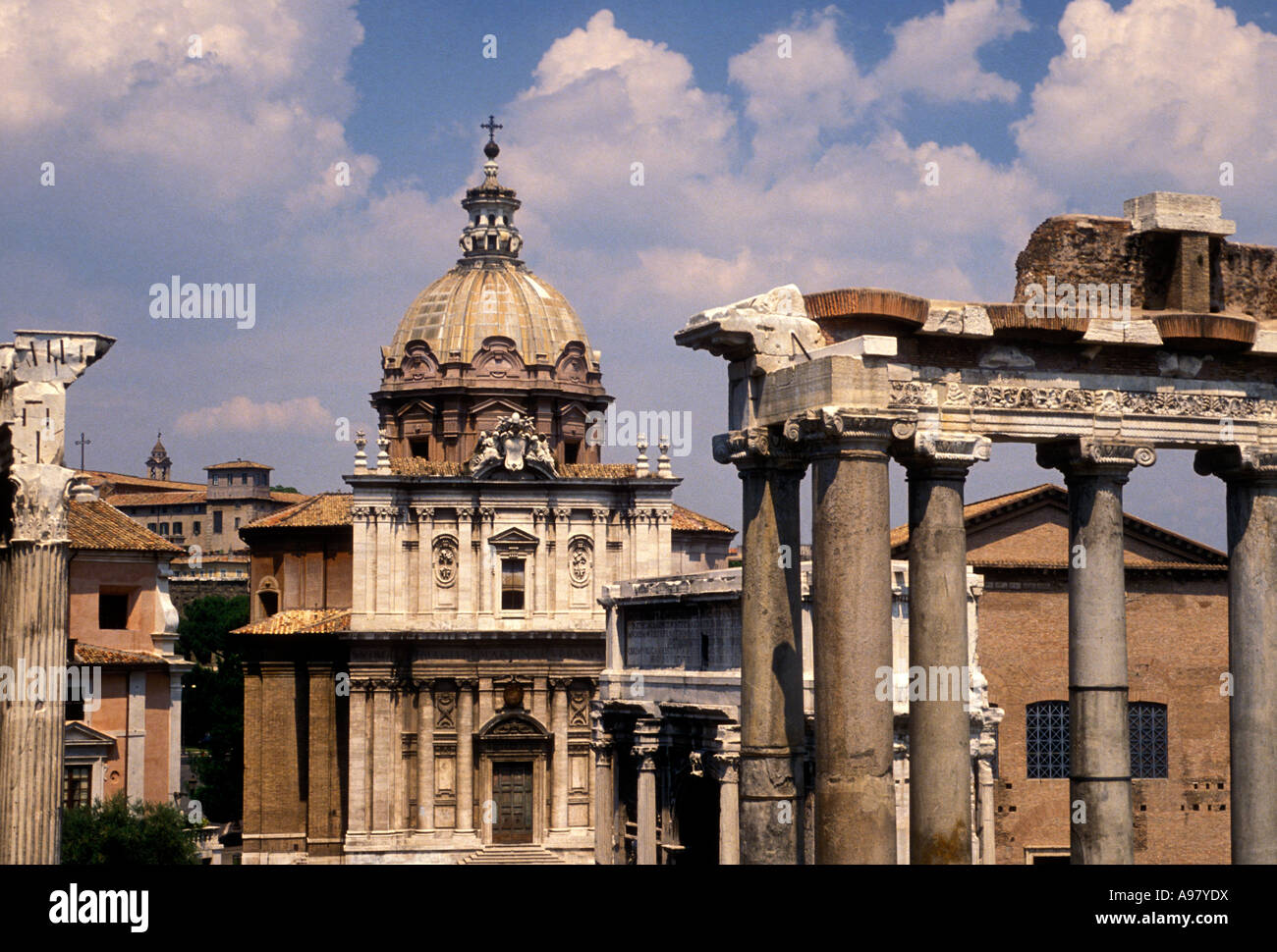 Santi Luca e Martina, Catholic church, left, and, Temple of Saturn ...