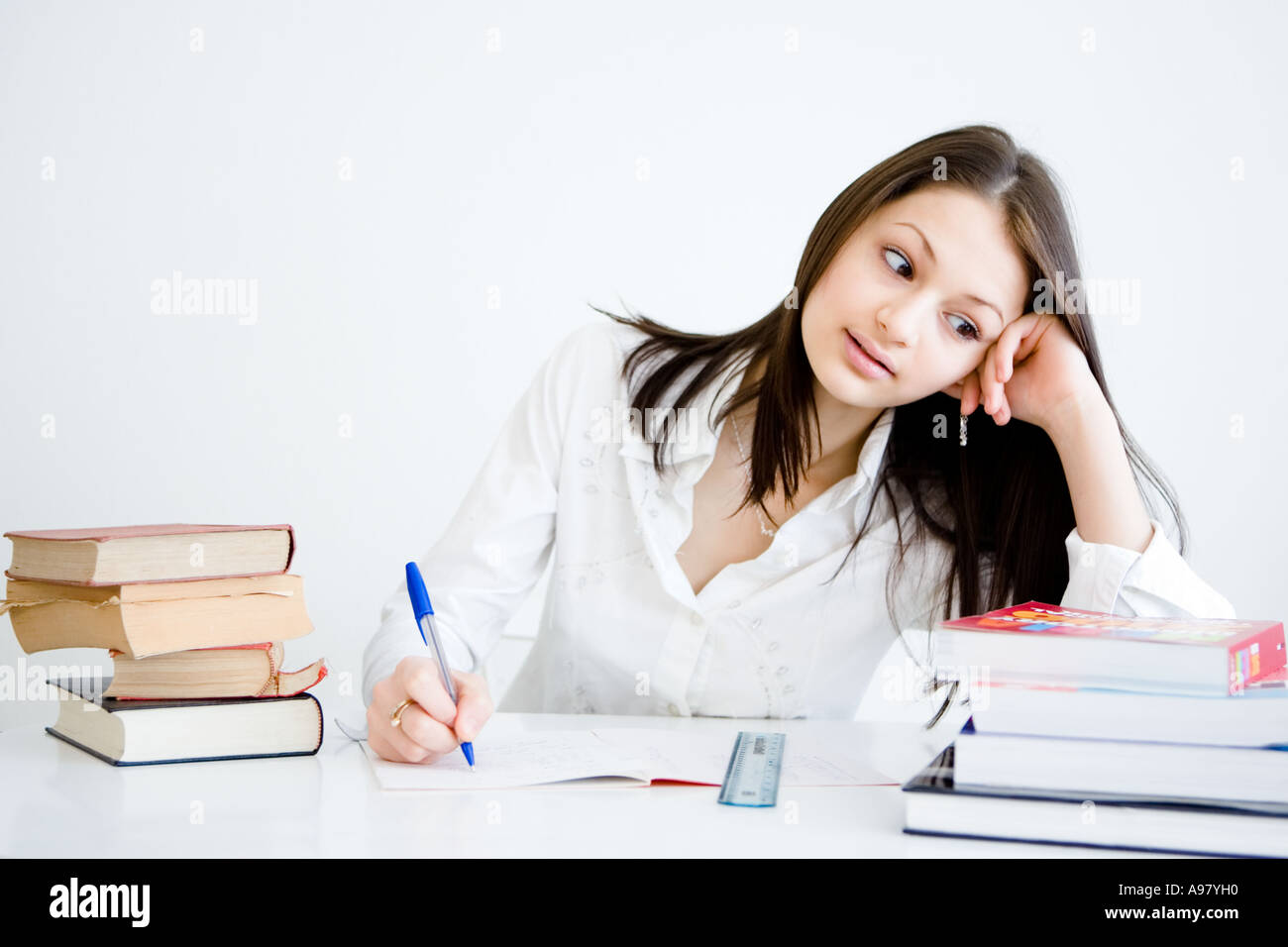 Young pretty girl studying for exams Stock Photo - Alamy